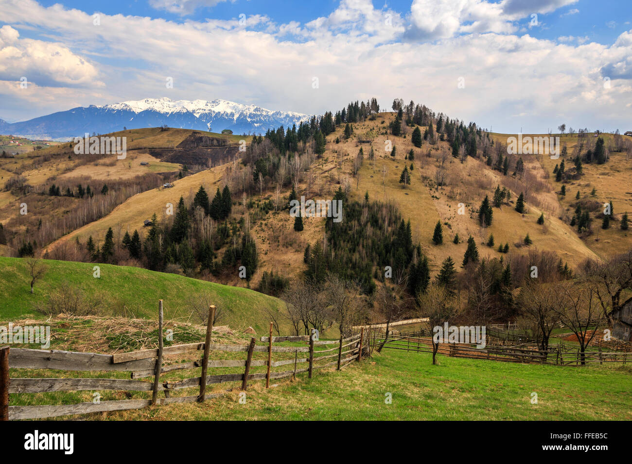 Wooden fence on a hill at early spring Stock Photo - Alamy