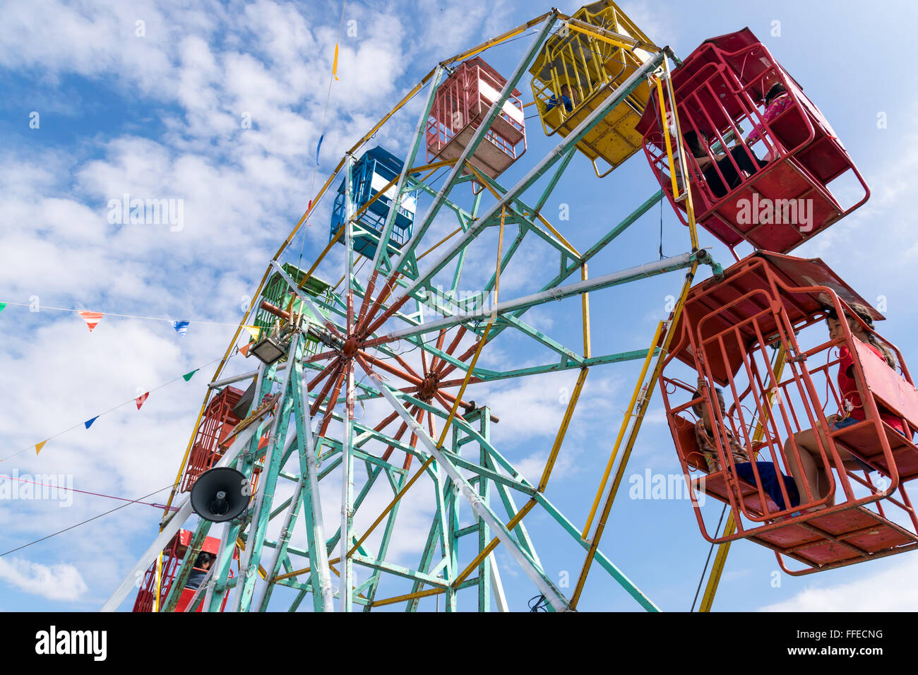 Ferris wheel in amusement park Stock Photo - Alamy
