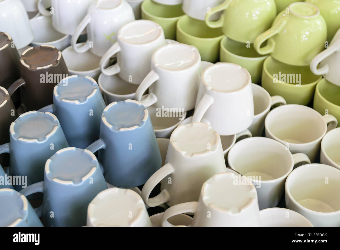 Groups of ceramic coffee cups in the shop for sale Stock Photo - Alamy