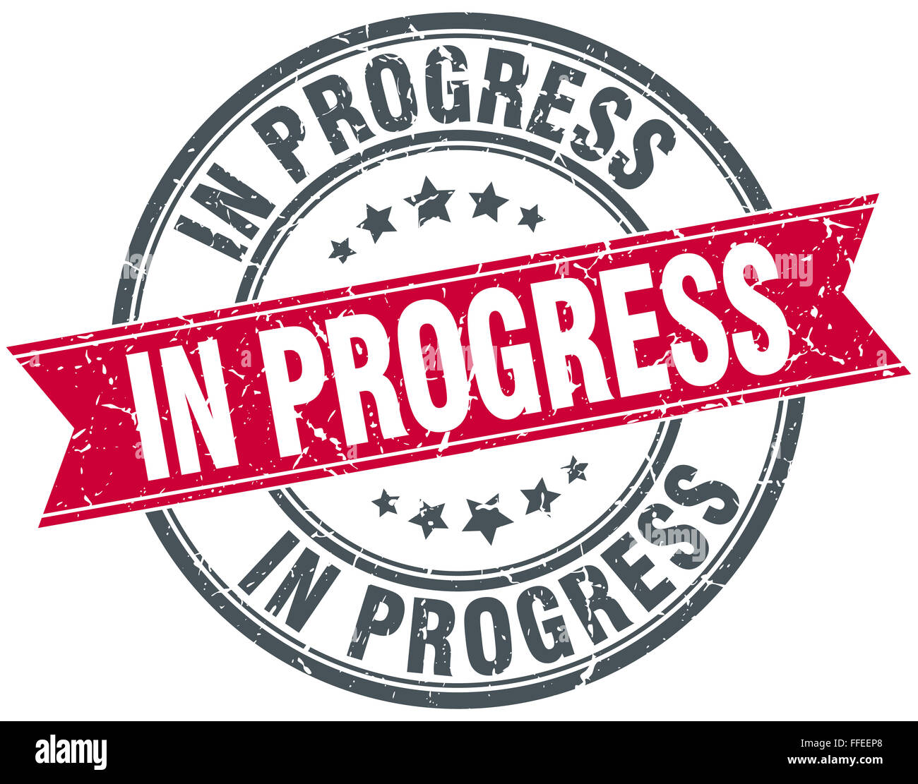 in progress red round grunge vintage ribbon stamp Stock Photo - Alamy