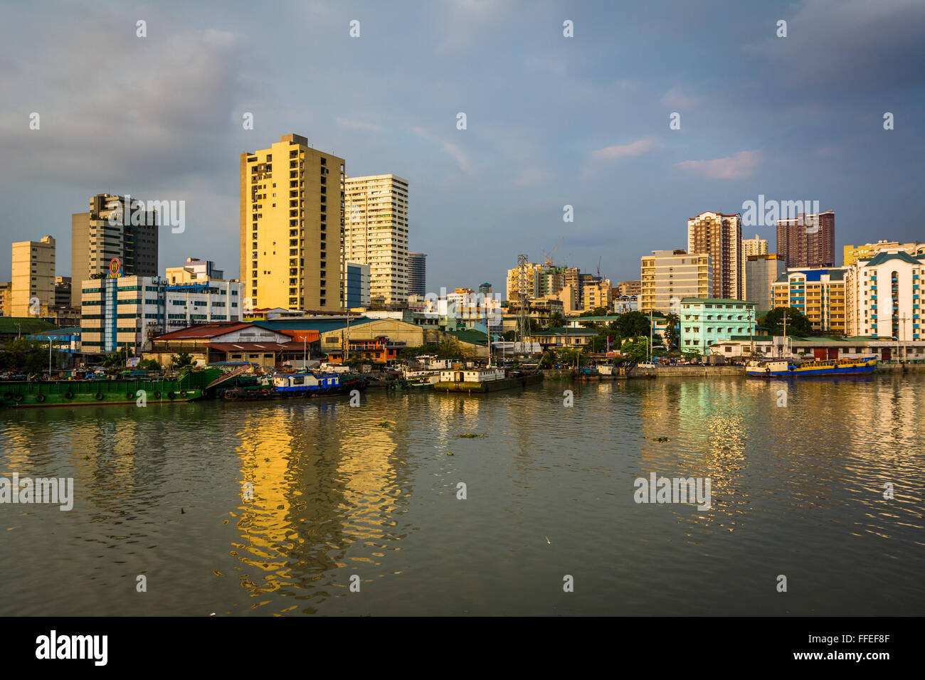 Buildings along the Pasig River, seen from Fort Santiago, in Intramuros ...