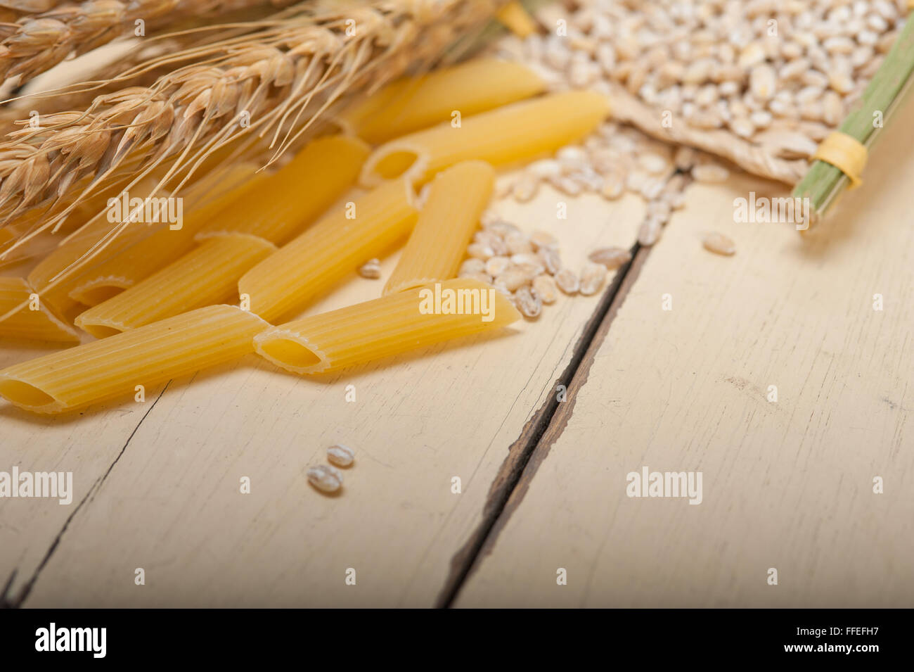 short Italian pasta penne with durum wheat grains Stock Photo - Alamy
