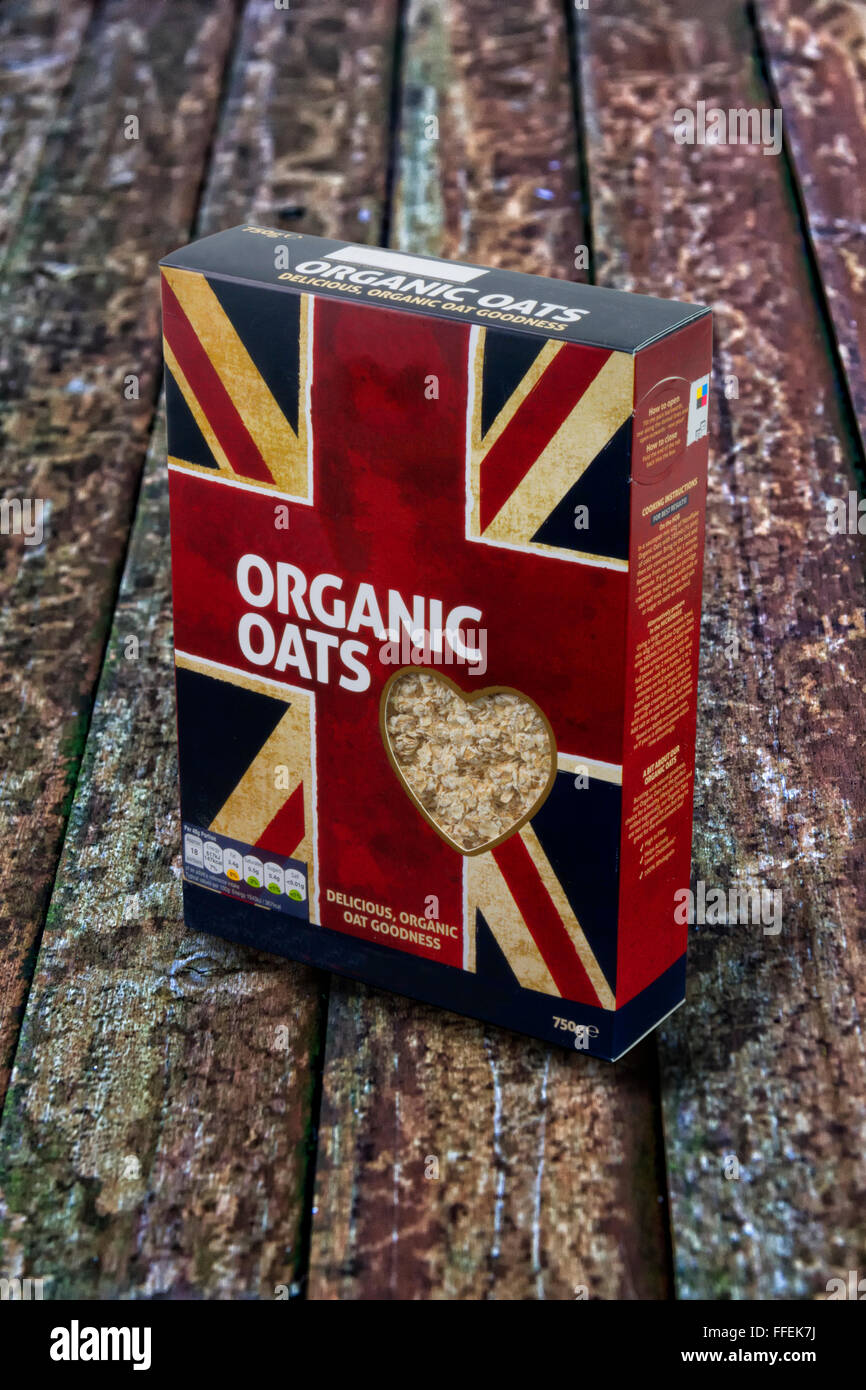 Breakfast cereal box of organic oats on a wooden background Stock Photo ...