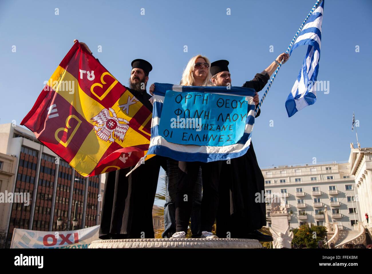 Greek-Orthodox prists and faithful Greeks protest against current Greek ...