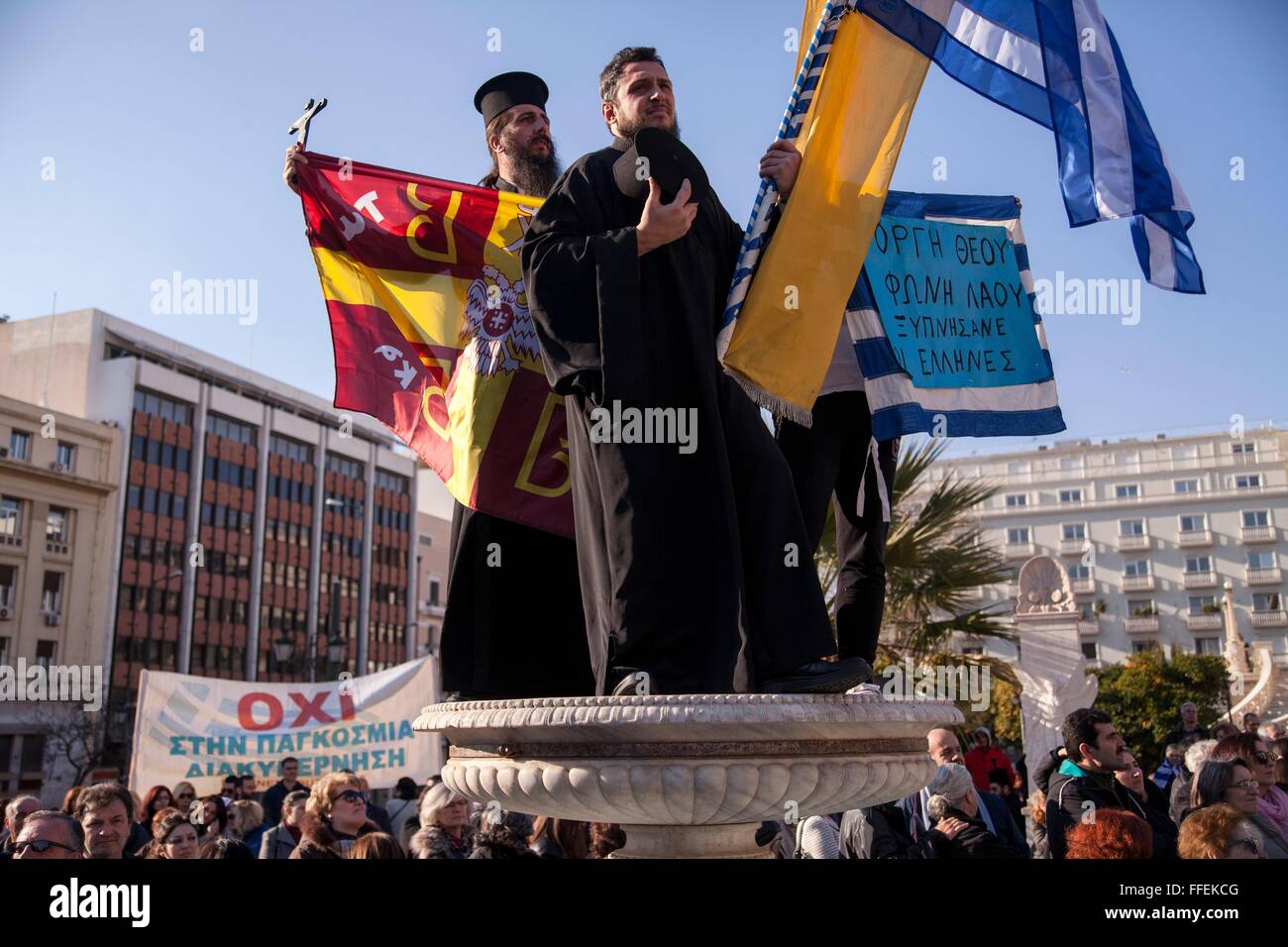 Greek-Orthodox prists and faithful Greeks protest against current Greek ...