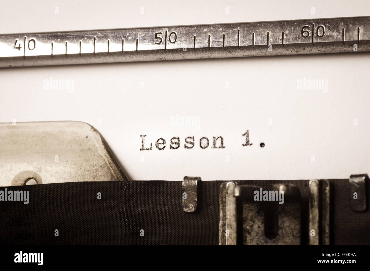 word lesson 1 written on old typewriter Stock Photo - Alamy