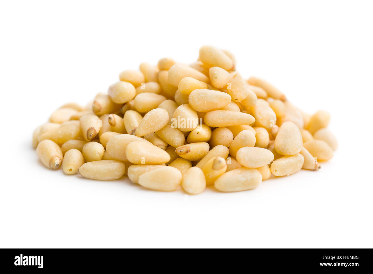 pine nuts on white background Stock Photo - Alamy