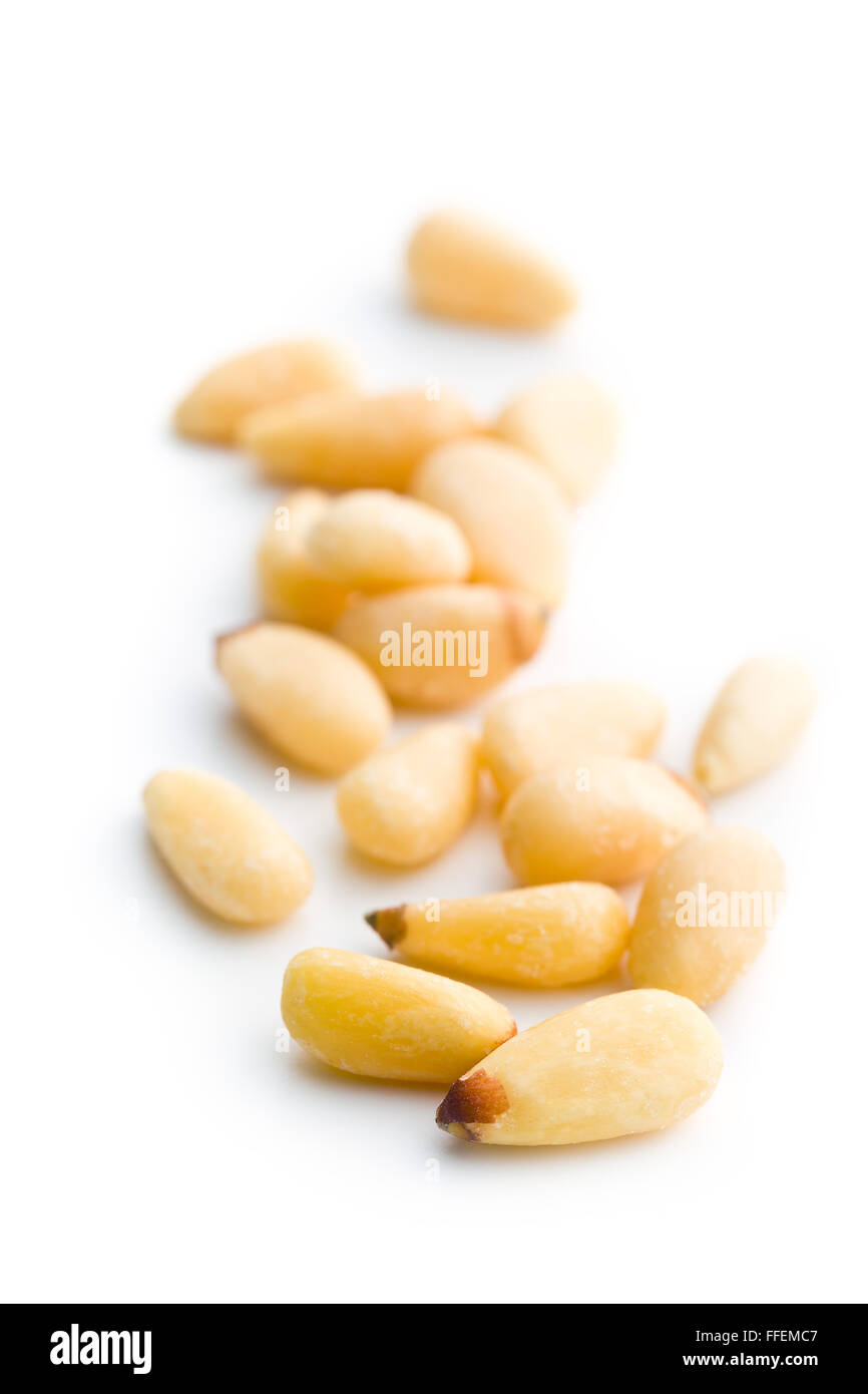 pine nuts on white background Stock Photo - Alamy