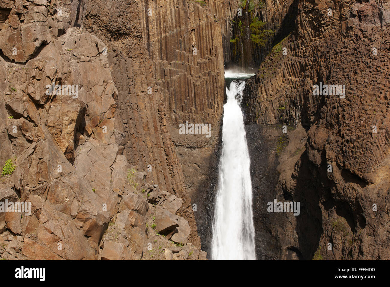 Icelandic landscape with basaltic rocks and waterfall. Horizontal Stock ...