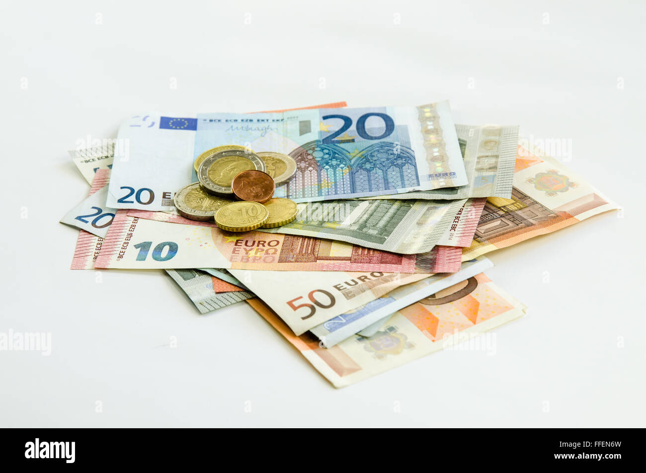 euro banknotes with different denomination and coins Stock Photo - Alamy