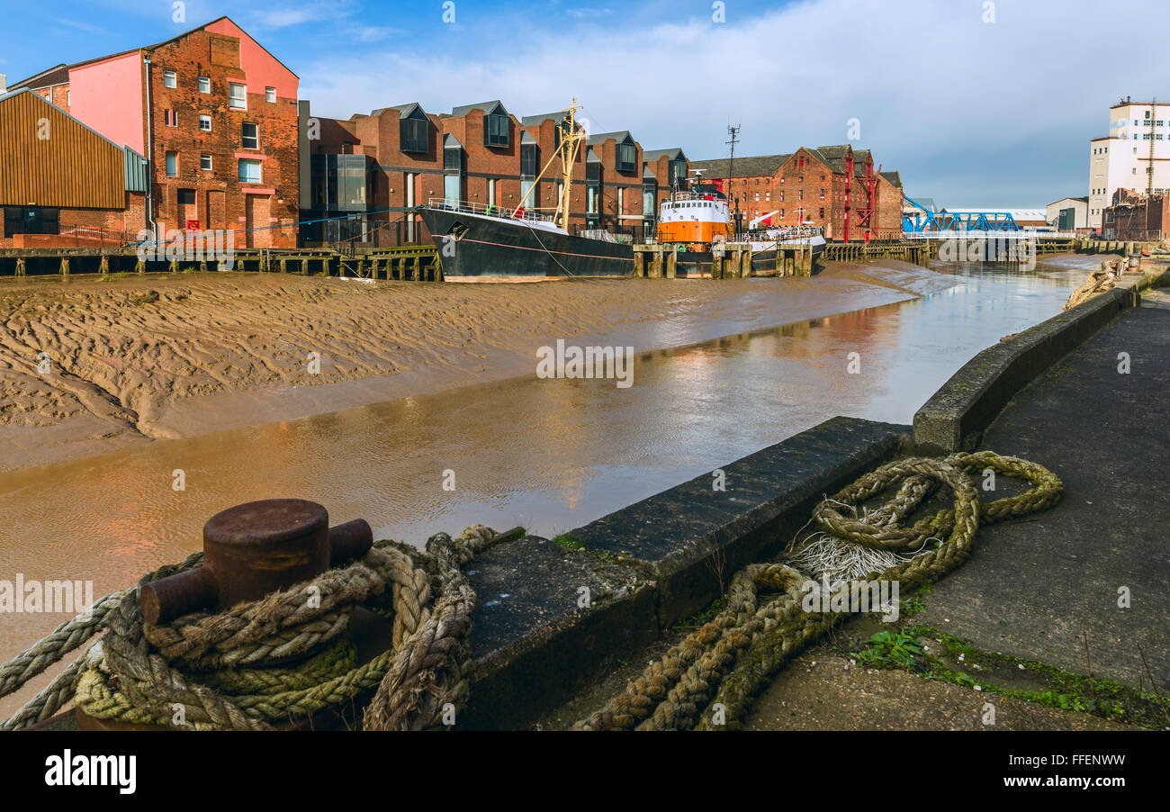 River Hull at low tide with an obsolete ship aground in the mud bank ...