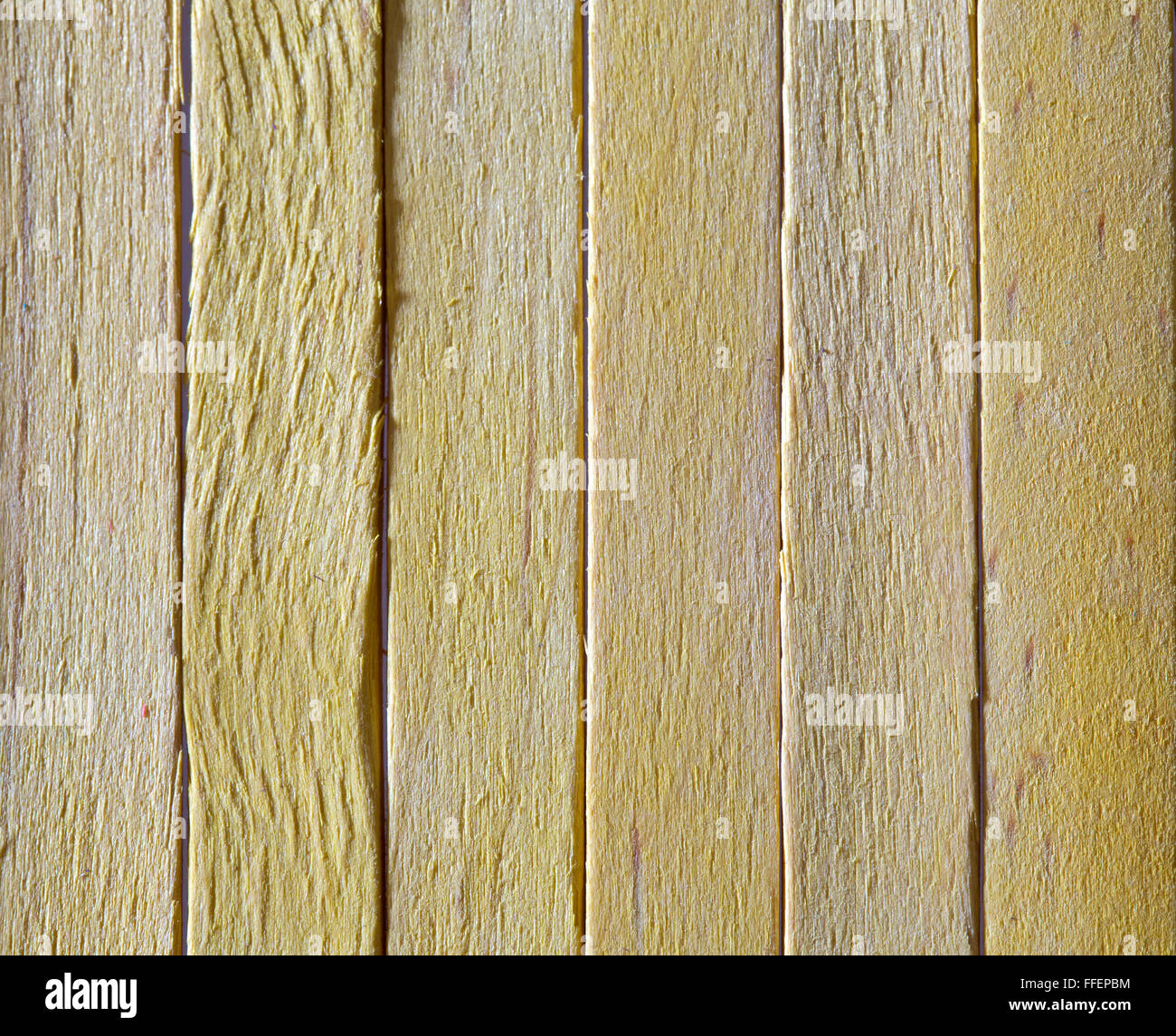 Rough, yellow colored wooden boards details Stock Photo - Alamy