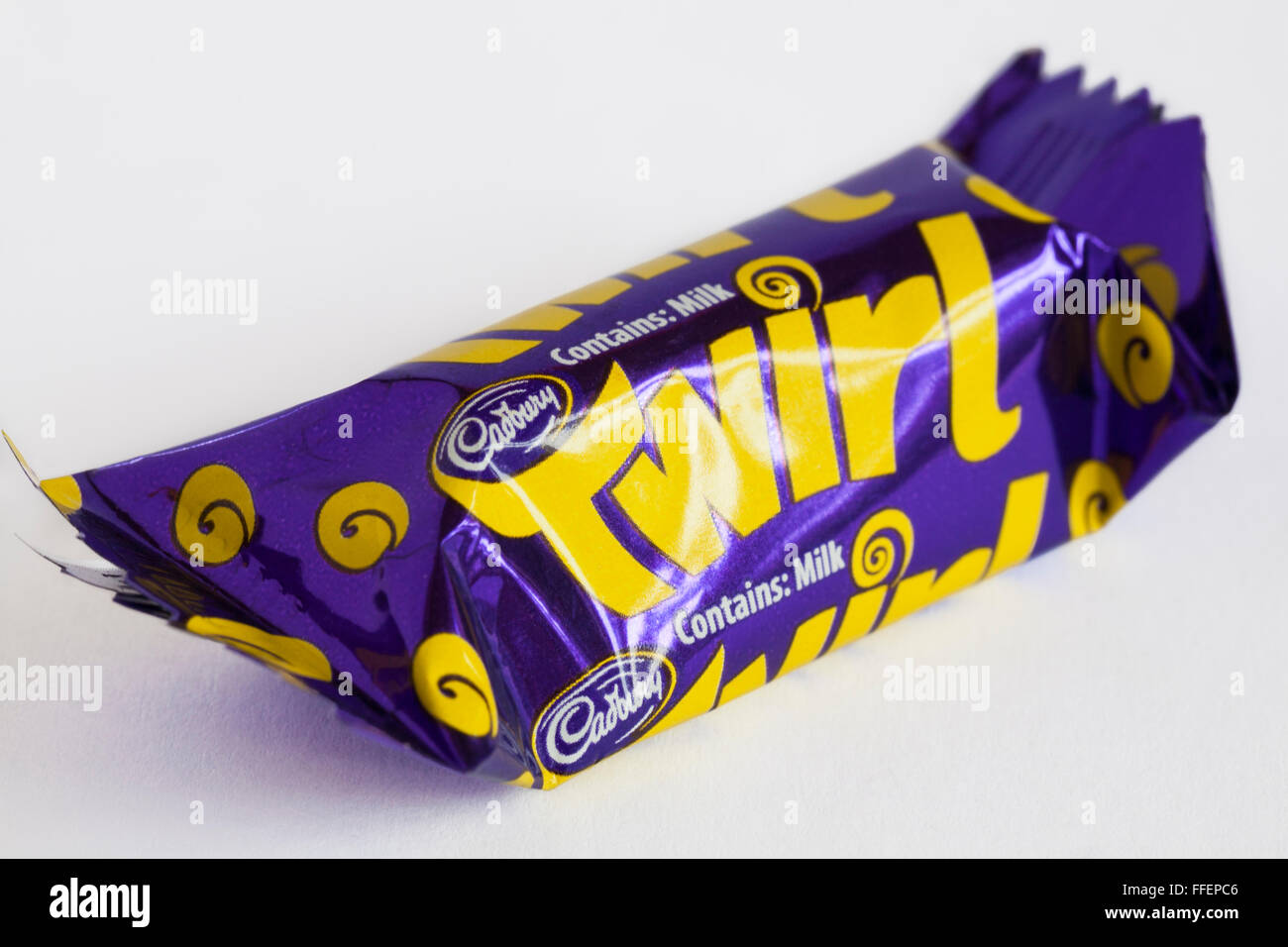 Cadbury Twirl chocolate from packet of Heroes set on white background ...
