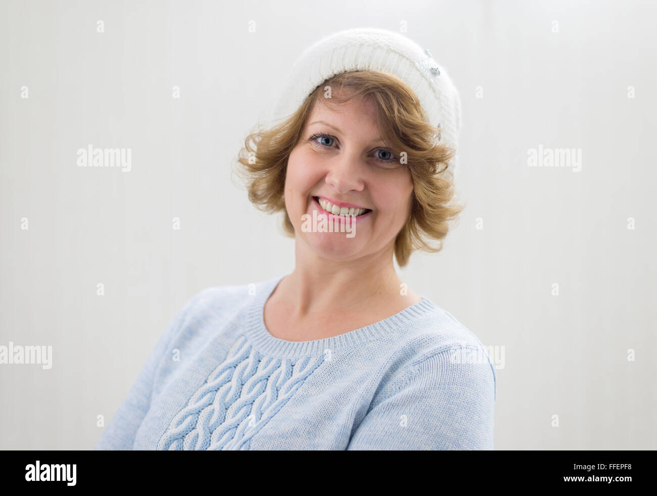 Wearing a white wool cap hi-res stock photography and images - Alamy