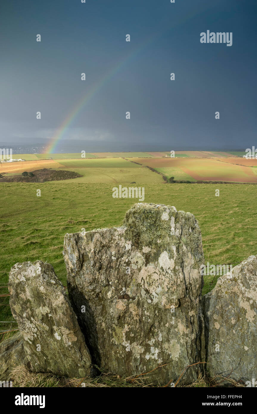 Rainbow and dark storm clouds. Bolt Tail, near Hope Cove, South Hams ...