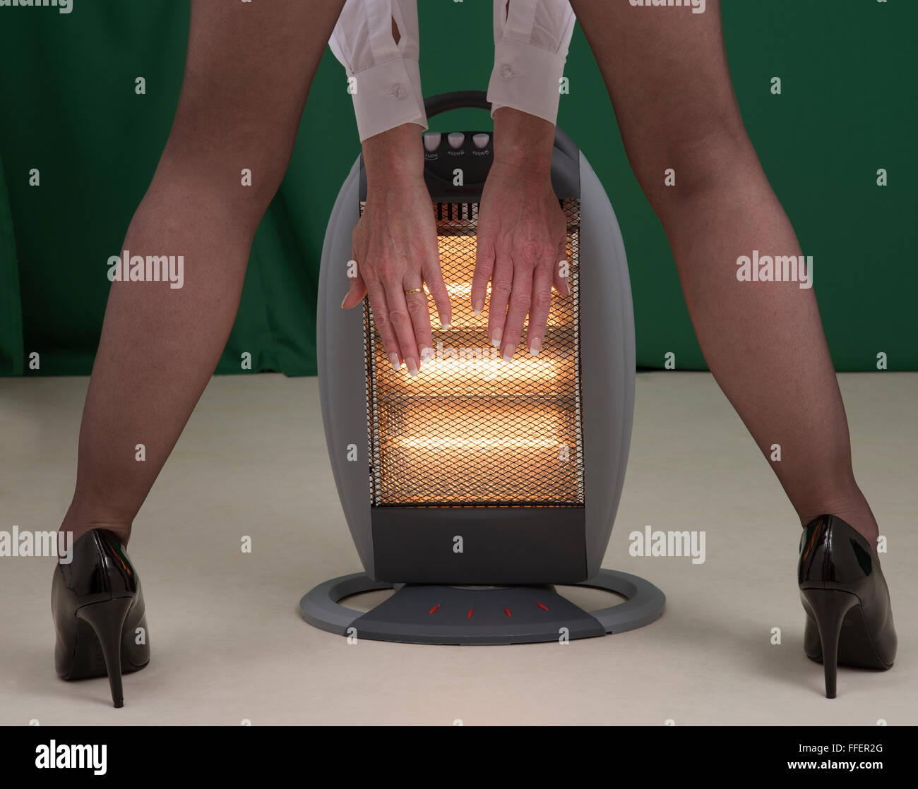 Warming hand over fire hi-res stock photography and images - Alamy