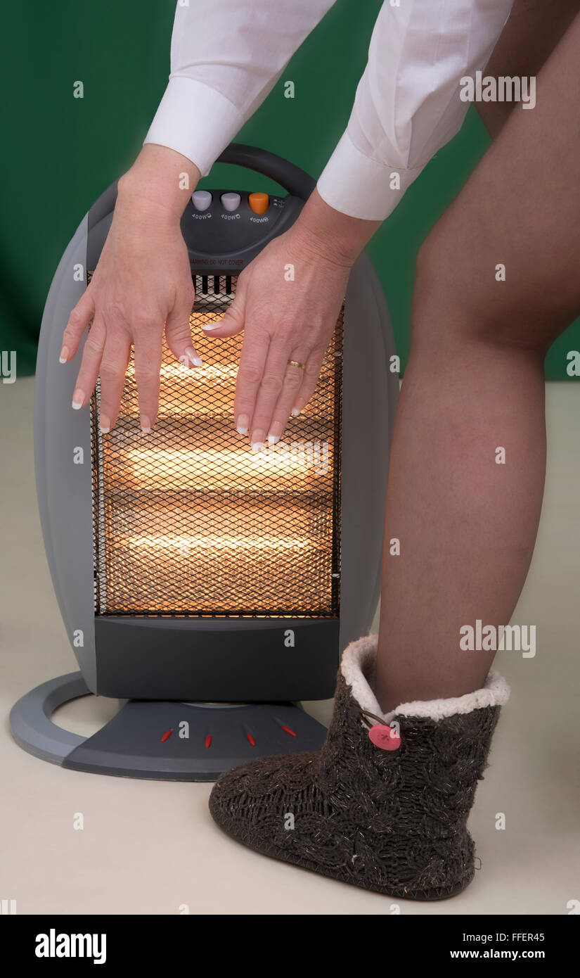 Warming fire hands hi-res stock photography and images - Alamy