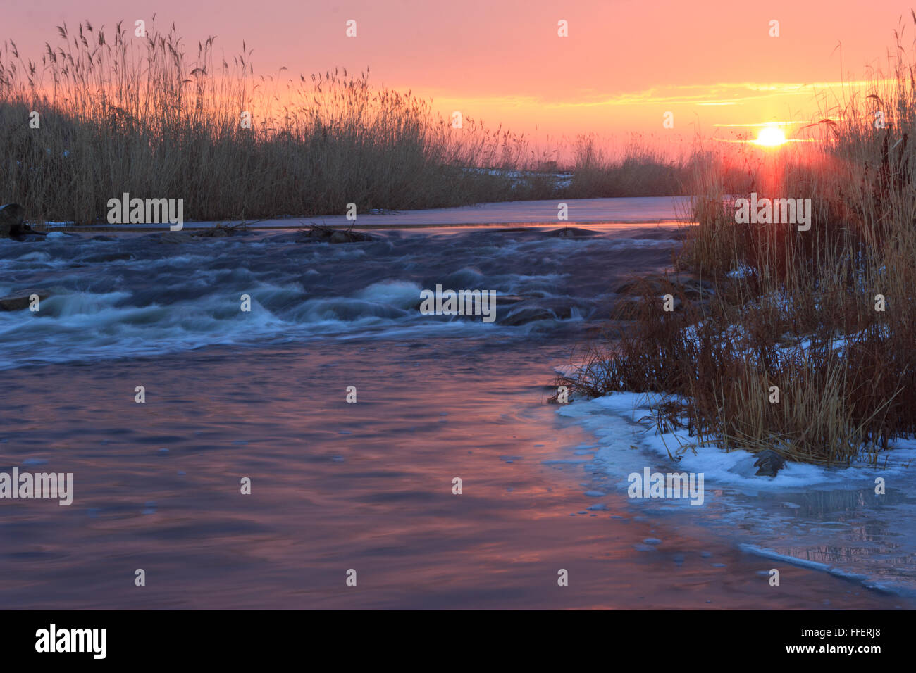 Dawn over Rushing winter river Stock Photo - Alamy