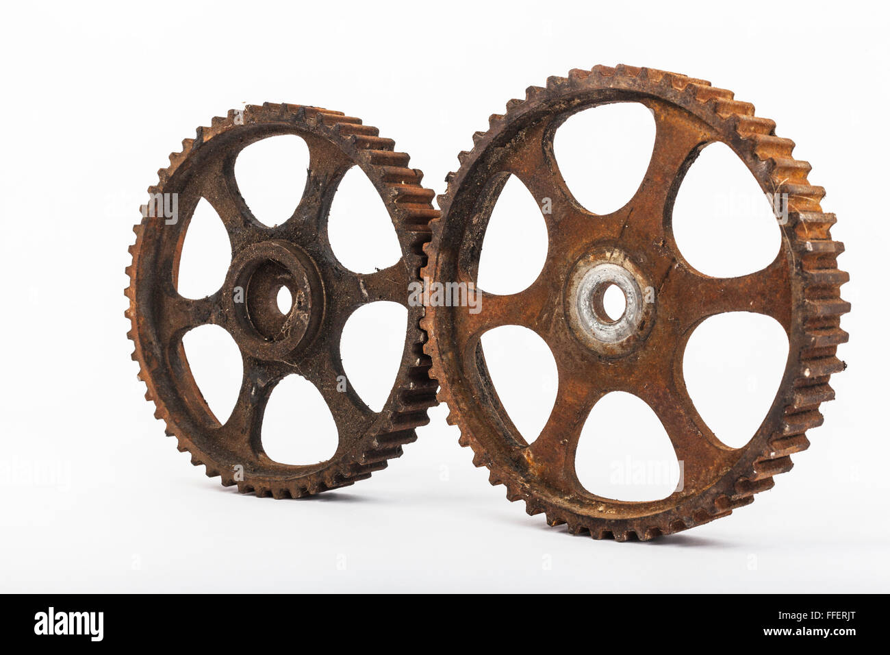 Two connected gears in hi-res stock photography and images - Alamy