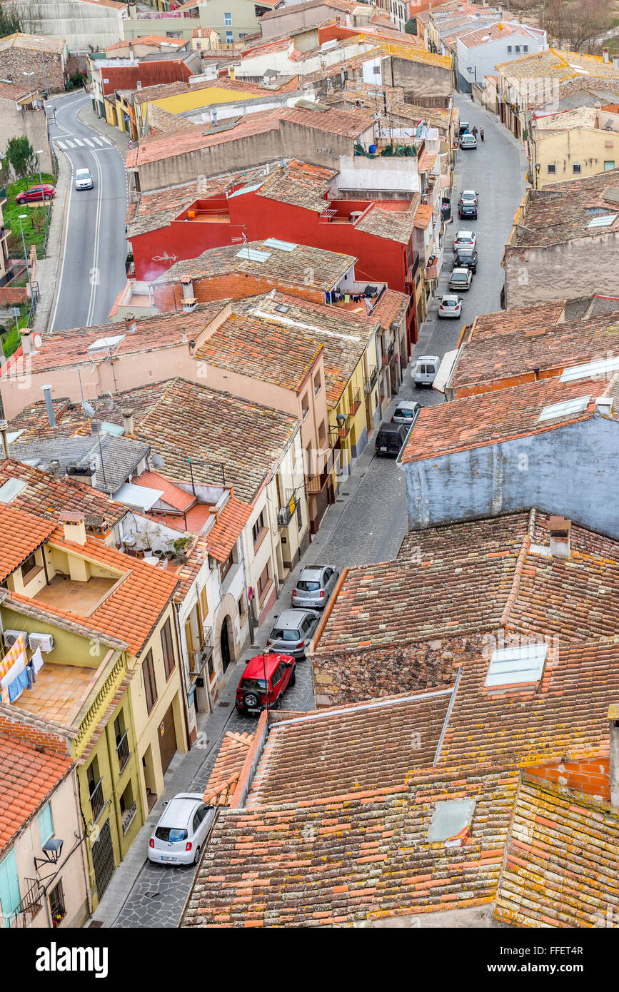 Roof tops along a curved street in a Spanish village Stock Photo - Alamy