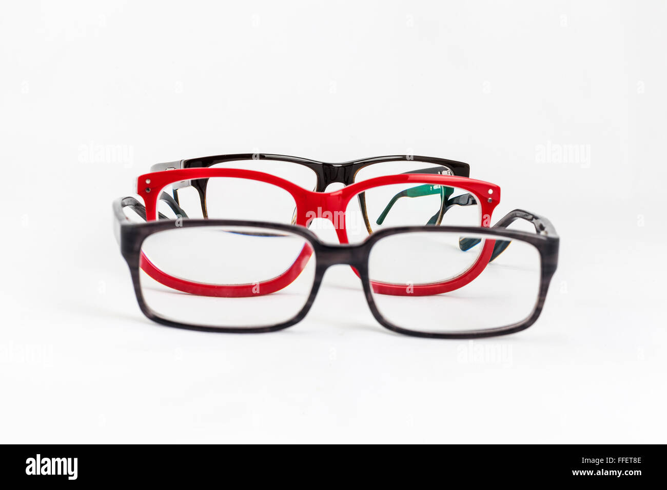 many red and black eyeglasses with white background Stock Photo - Alamy