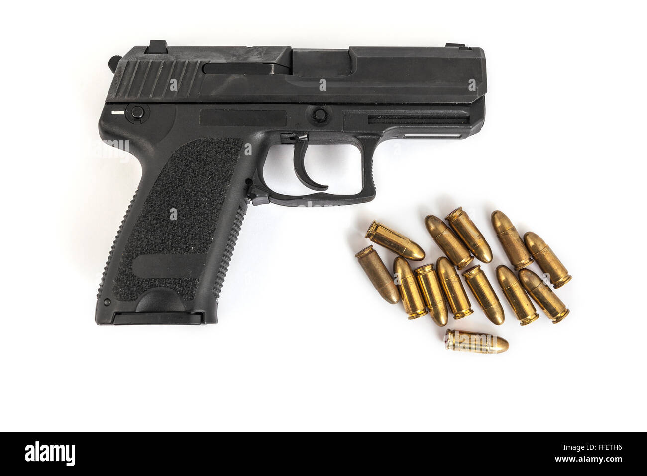 gun with bullets with white background Stock Photo - Alamy