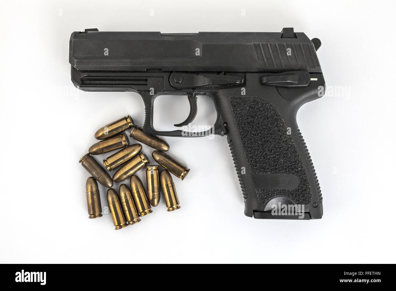 gun with bullets with white background Stock Photo - Alamy