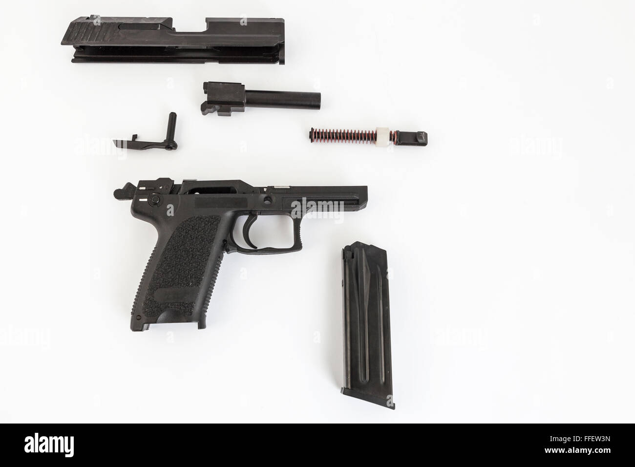 Disassembled gun pistol on white hi-res stock photography and images ...