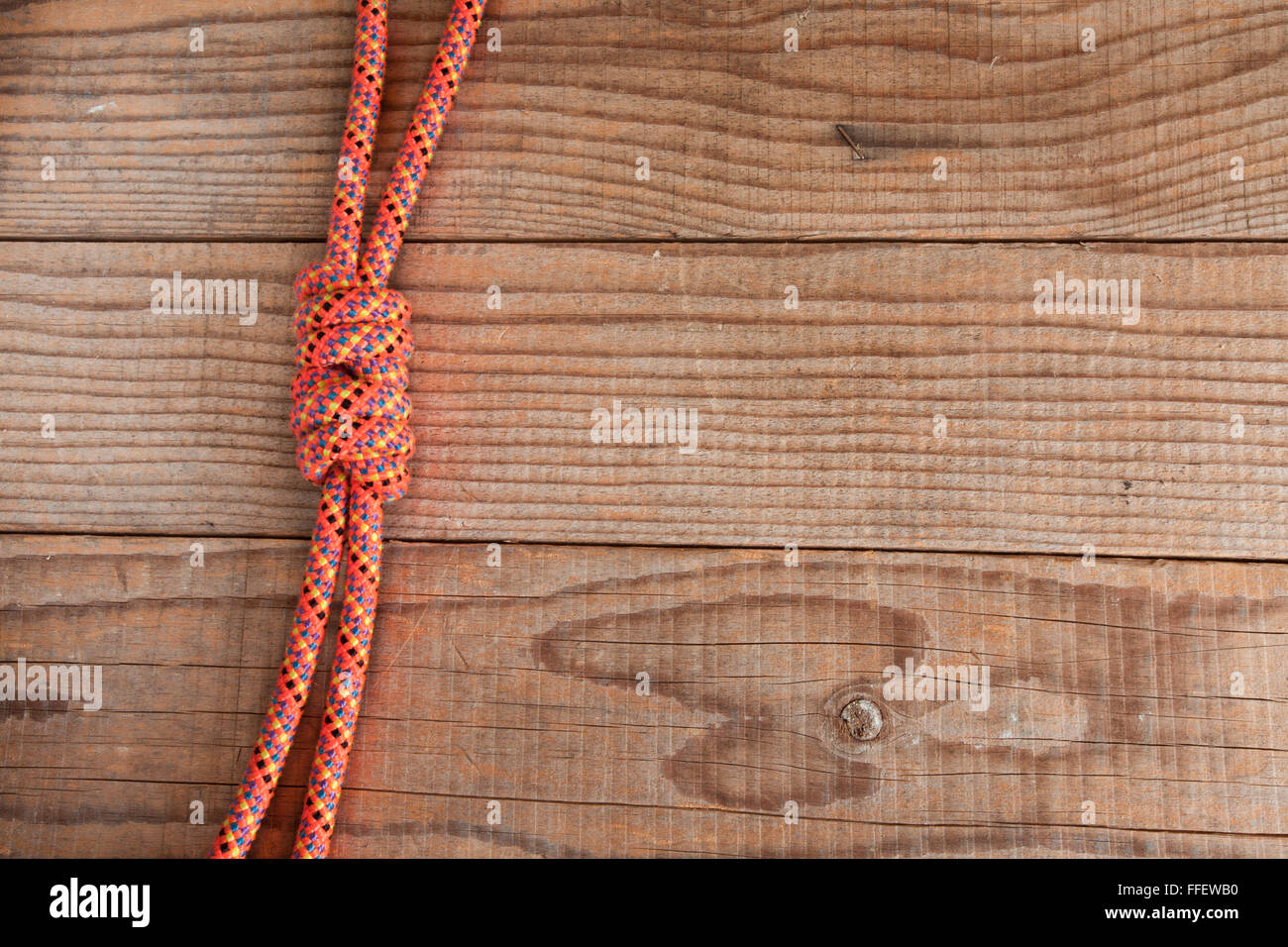 Junction between two mountain ropes on wooden background Stock Photo ...