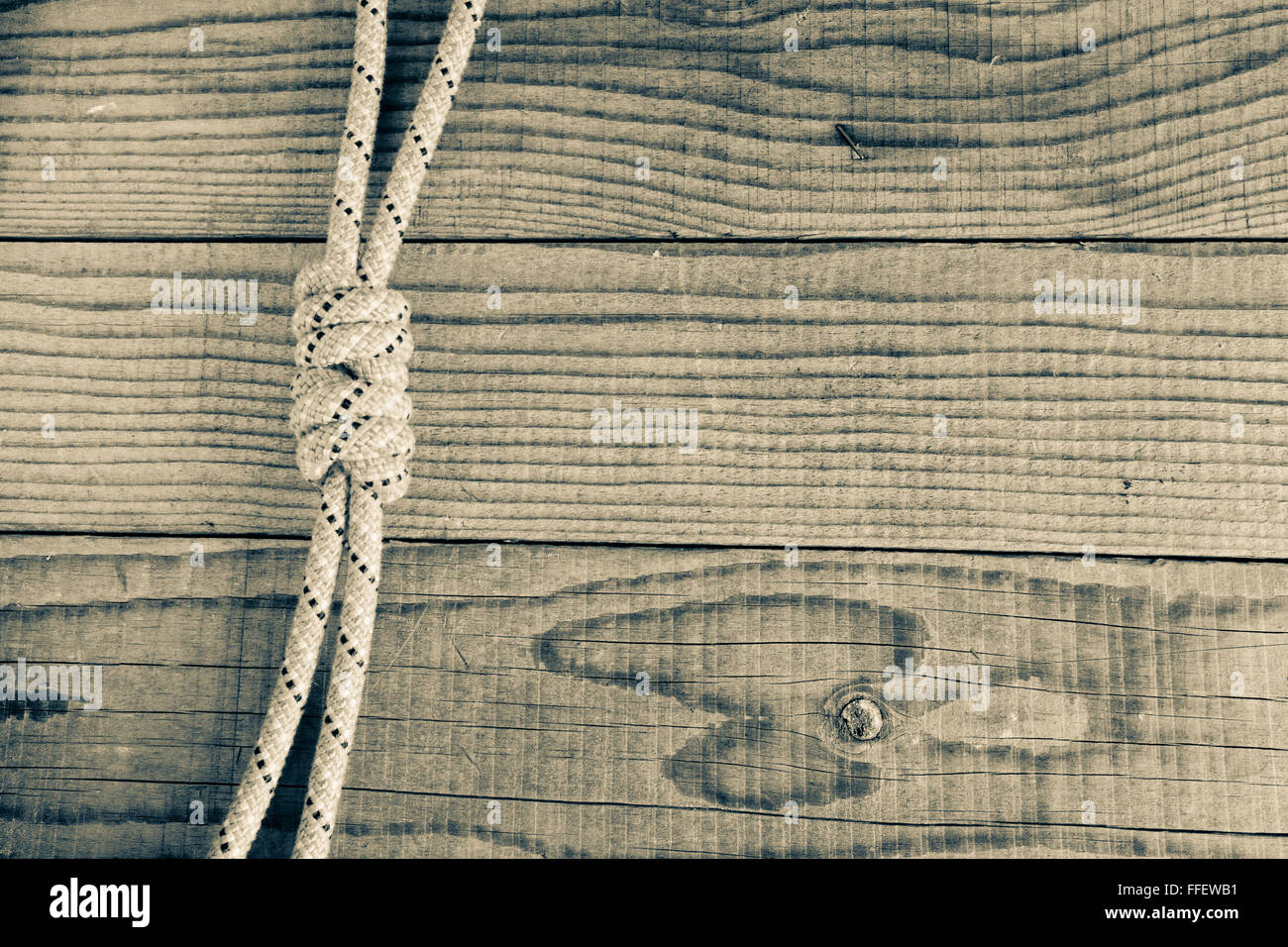 Junction between two mountain ropes on wooden background Stock Photo ...
