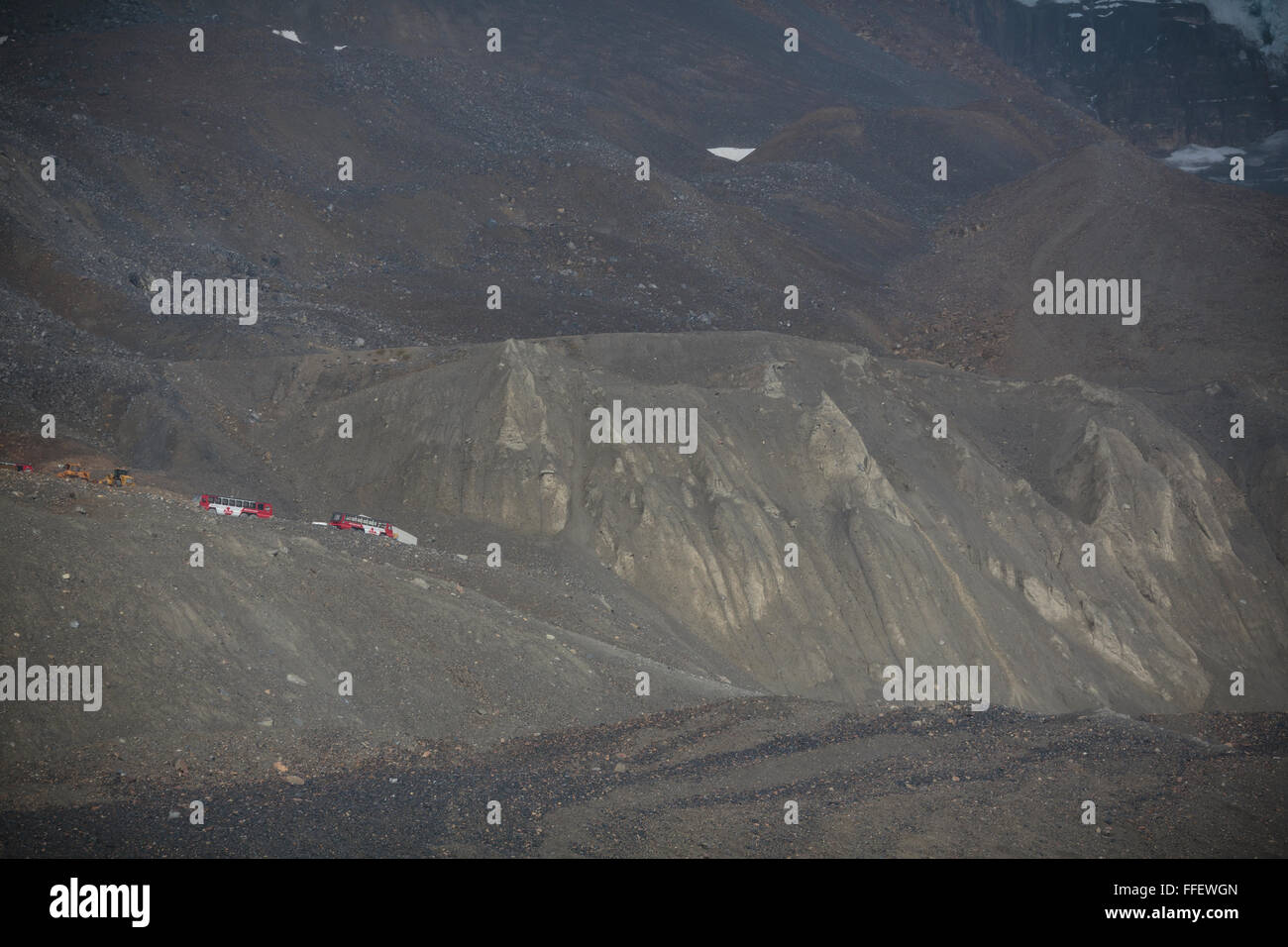 Brewster Ice Explorers traverse the moraine above the Athabasca Glacier ...