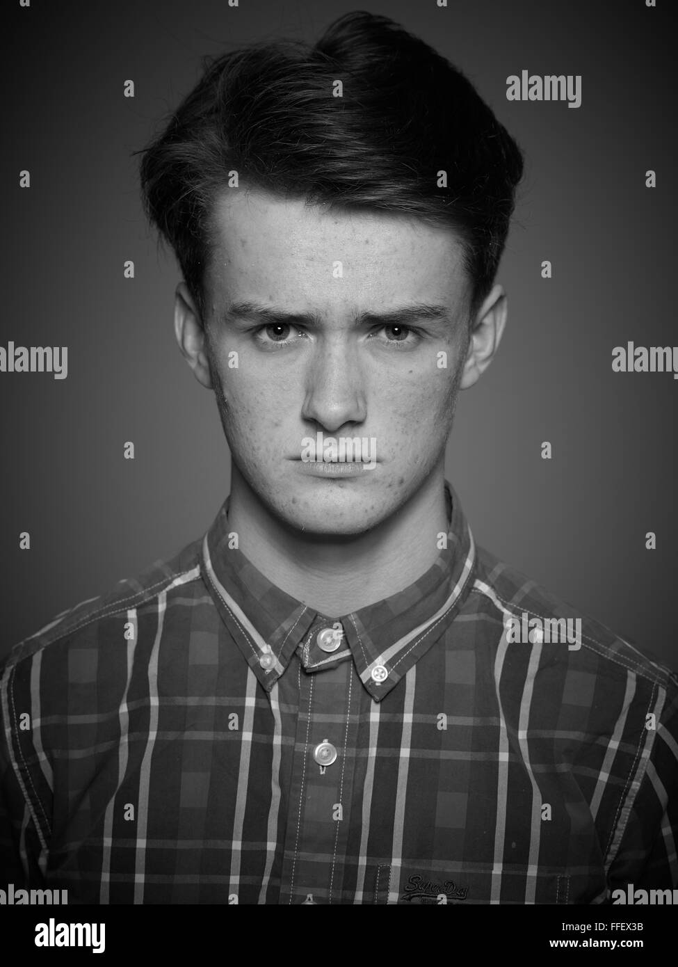 black and white image of Male looks intensely towards the camera Stock ...