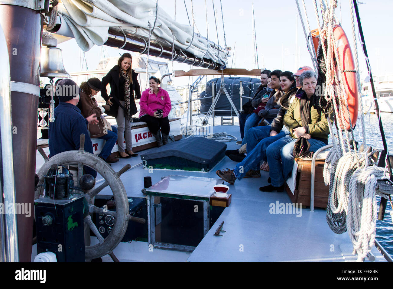 A scene with visitors on board the excursion vessel Schooner Freedom ...