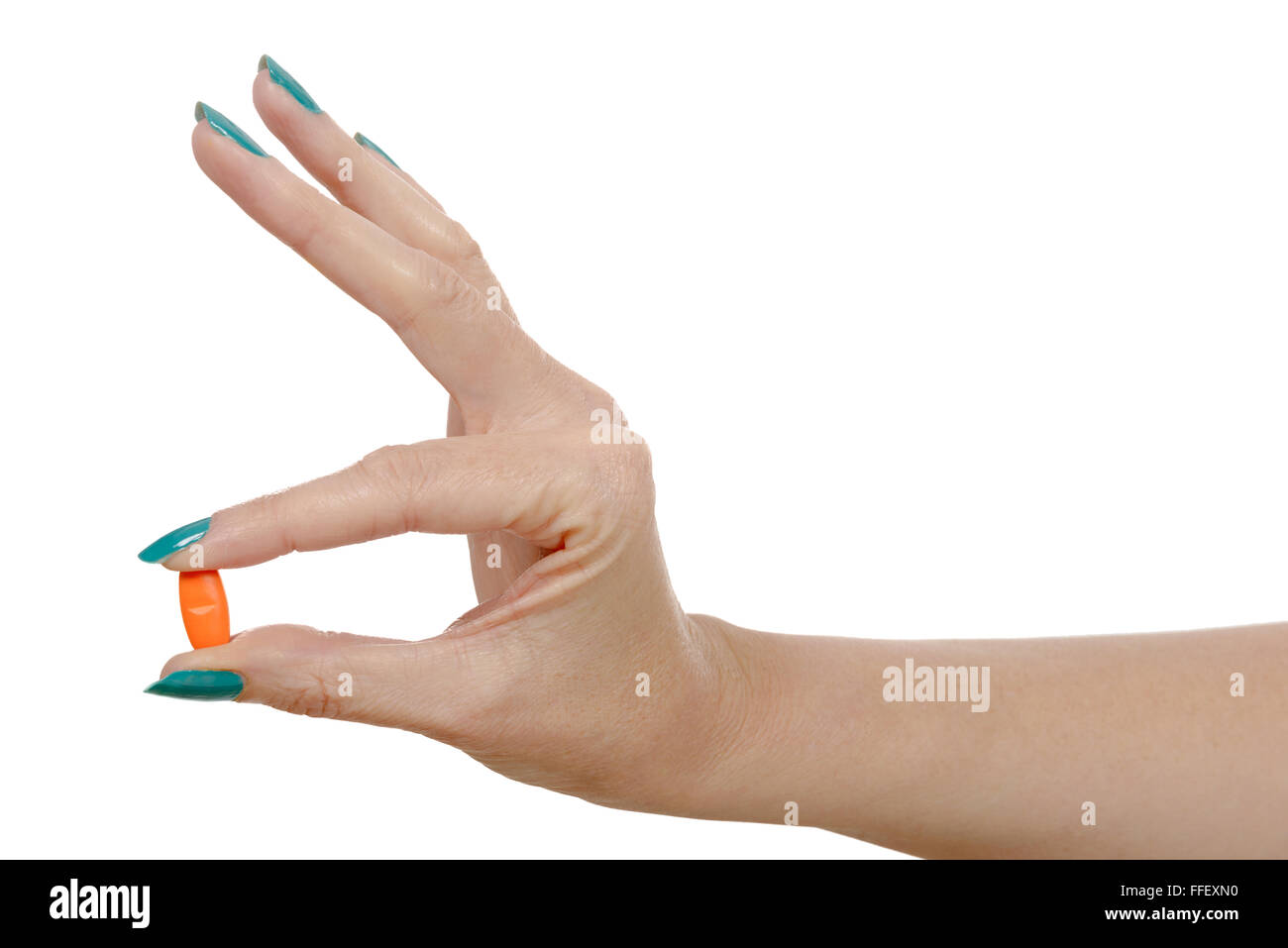 a woman hand and pill isolated on white background Stock Photo - Alamy