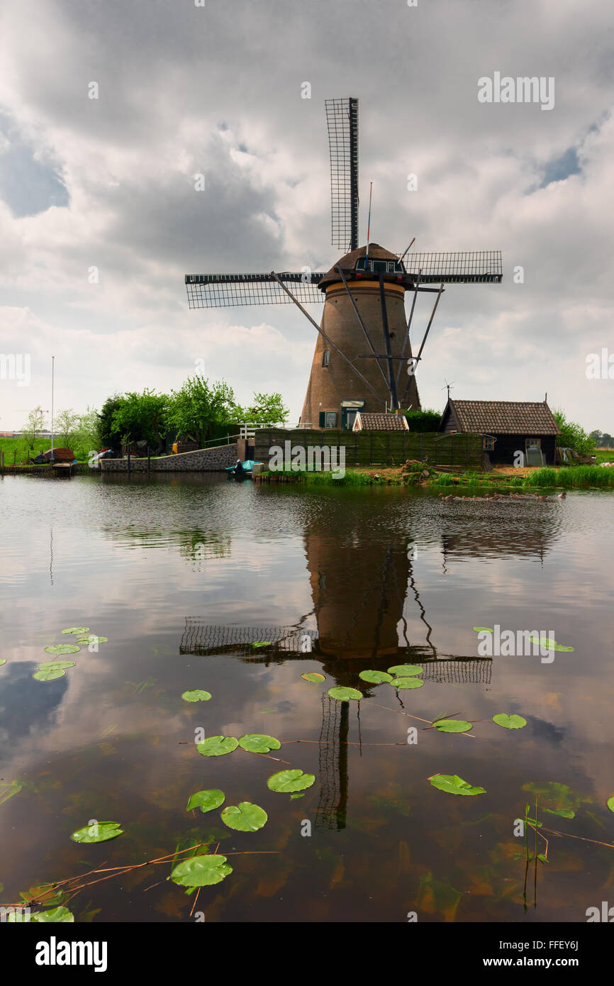 dutch windmill over water Stock Photo - Alamy