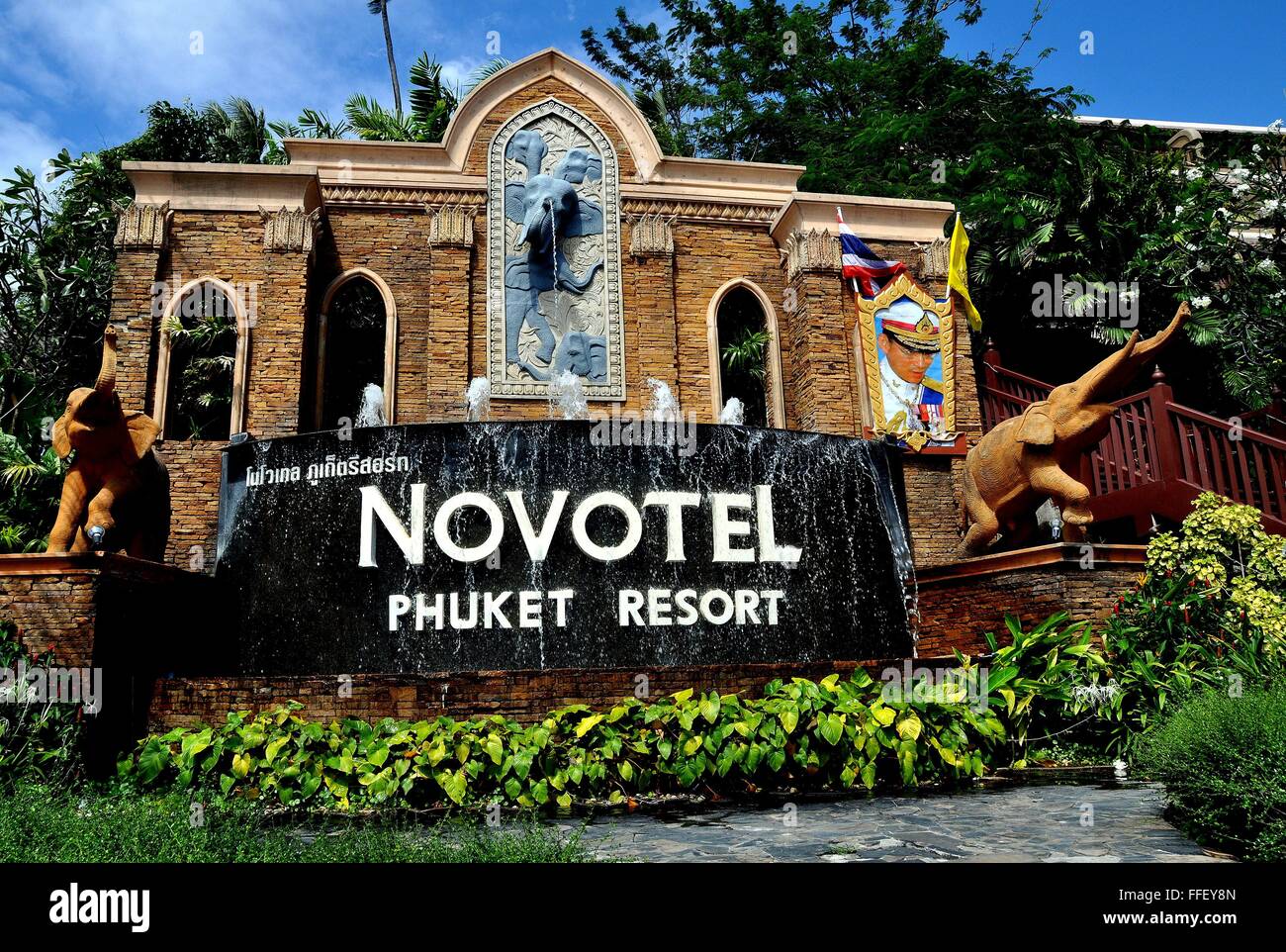 Phuket, Thailand: Entrance sign with carved elephants, portrait of the ...