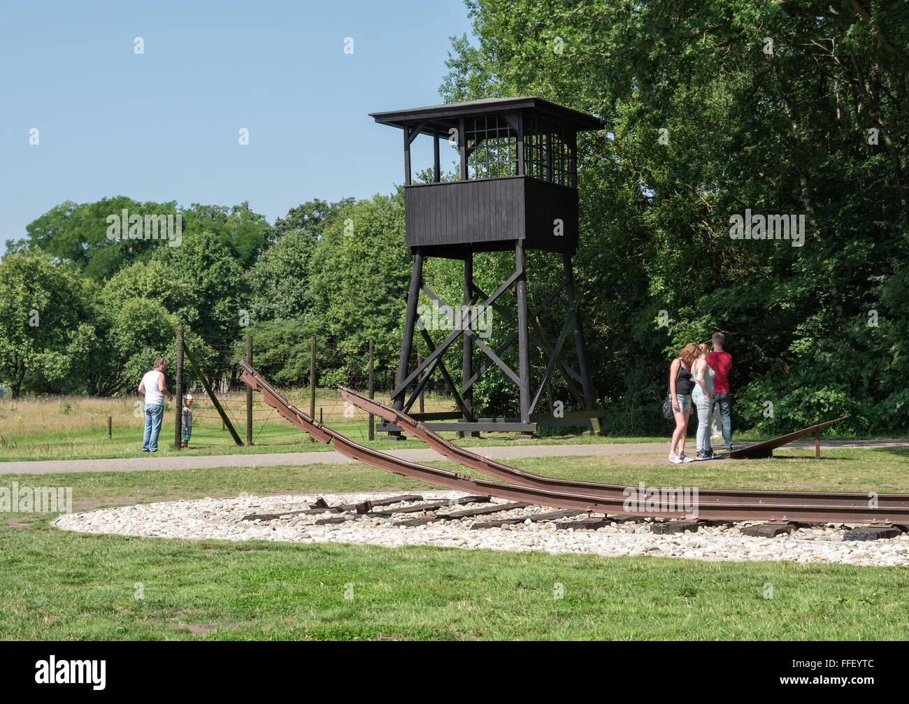 WESTERBORK, NETHERLANDS - 13 AUG. 2015: Watchtower and railway track at ...