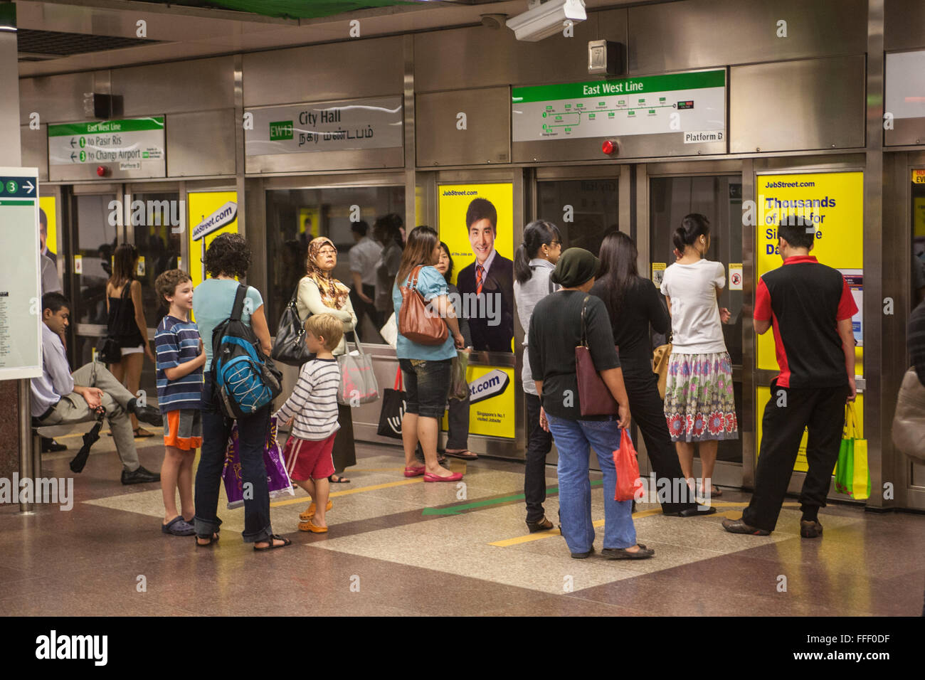 Waiting for a train on platform in centre,center of Singapore.Transport ...