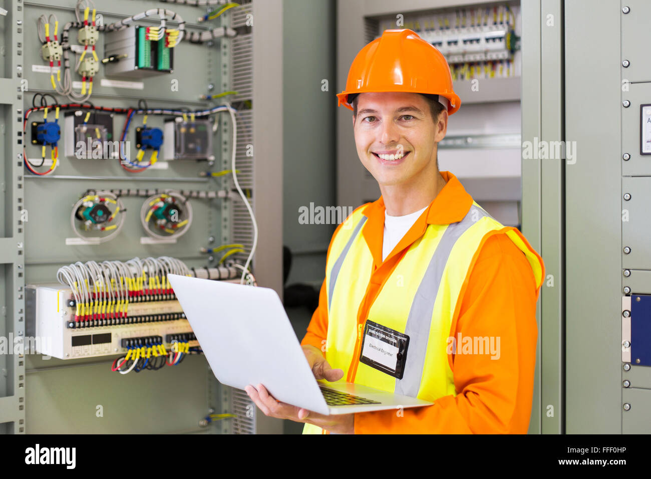 professional control room engineer using laptop Stock Photo - Alamy