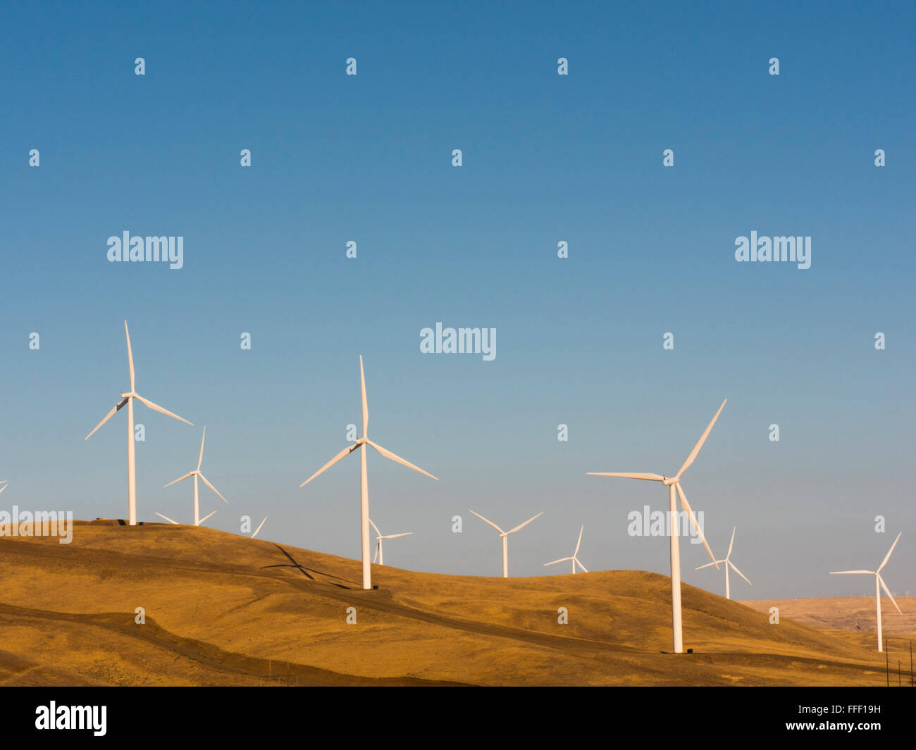 Wind turbines lining the hills in the US western high desert Stock ...