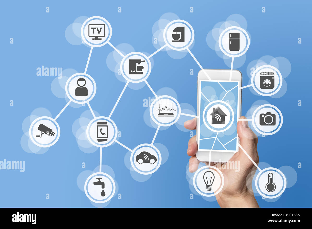 Home automation concept with hand holding modern smart phone to control ...