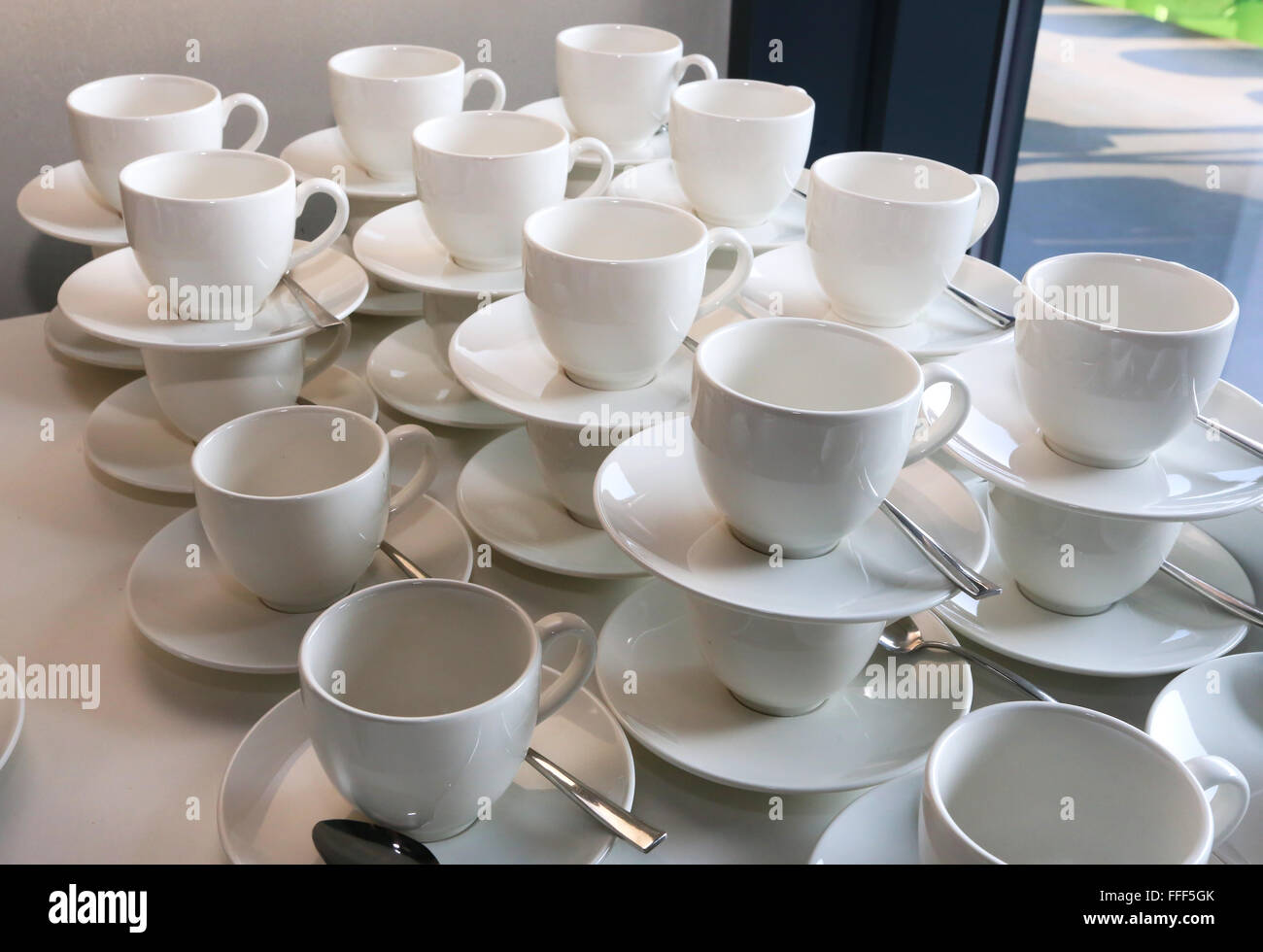 Coffee cups lined up in cafeteria or coffee house Stock Photo - Alamy