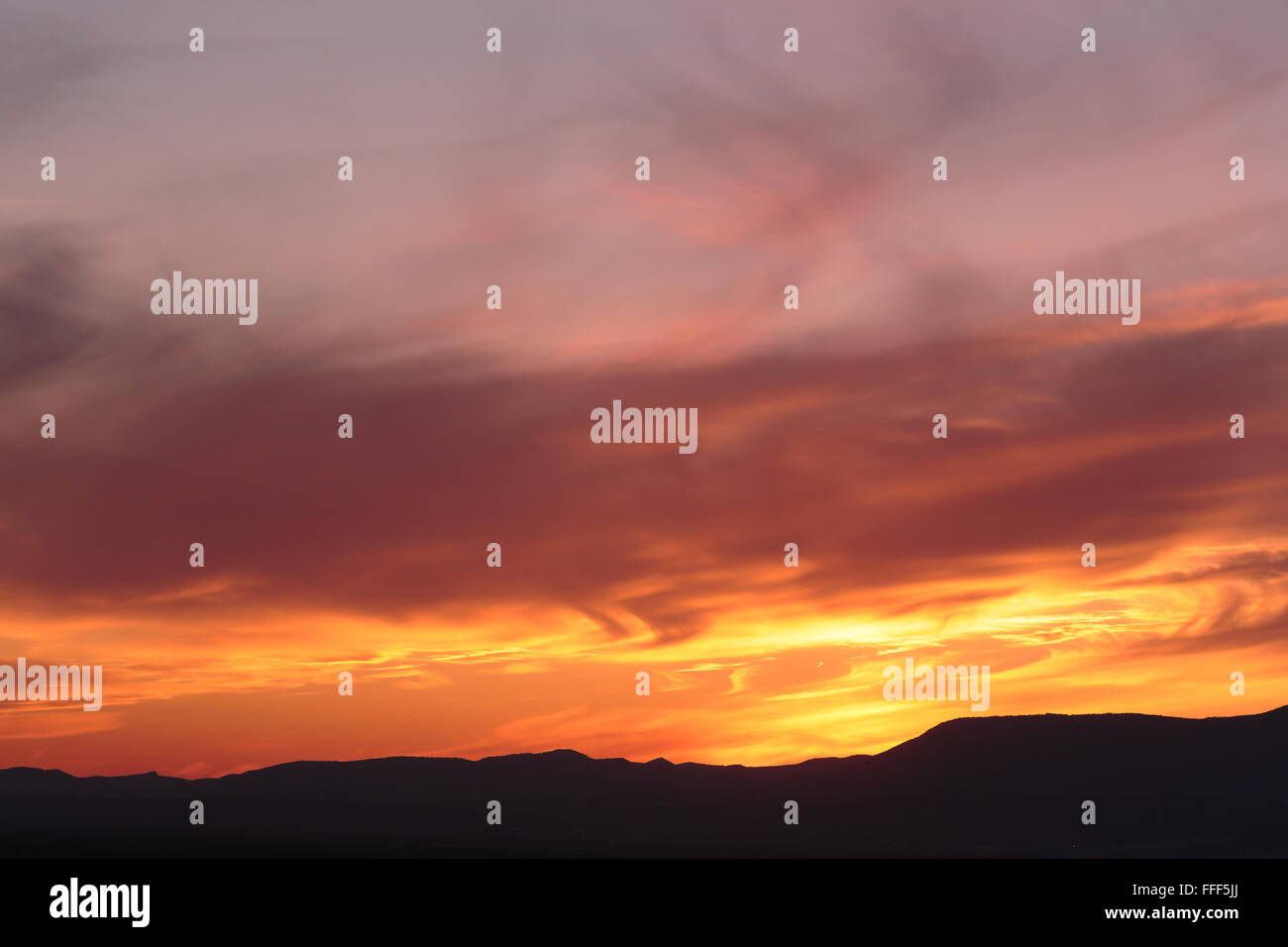 Dramatic colorful sunset orange and red tones Stock Photo - Alamy