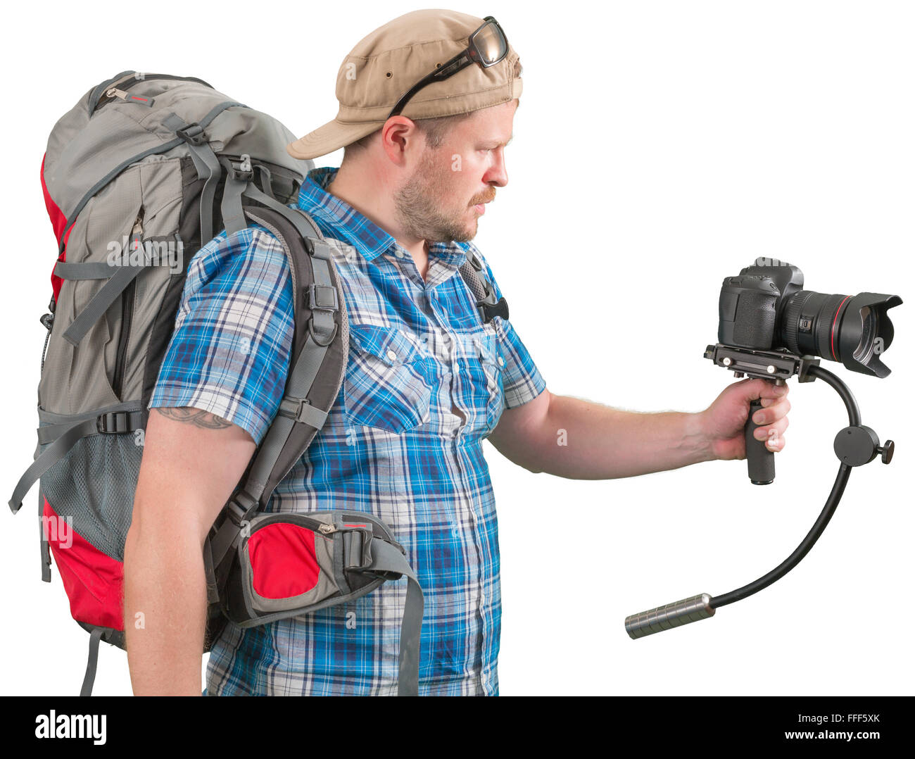 Backpacker makes shooting by steadycam on white background isolated ...
