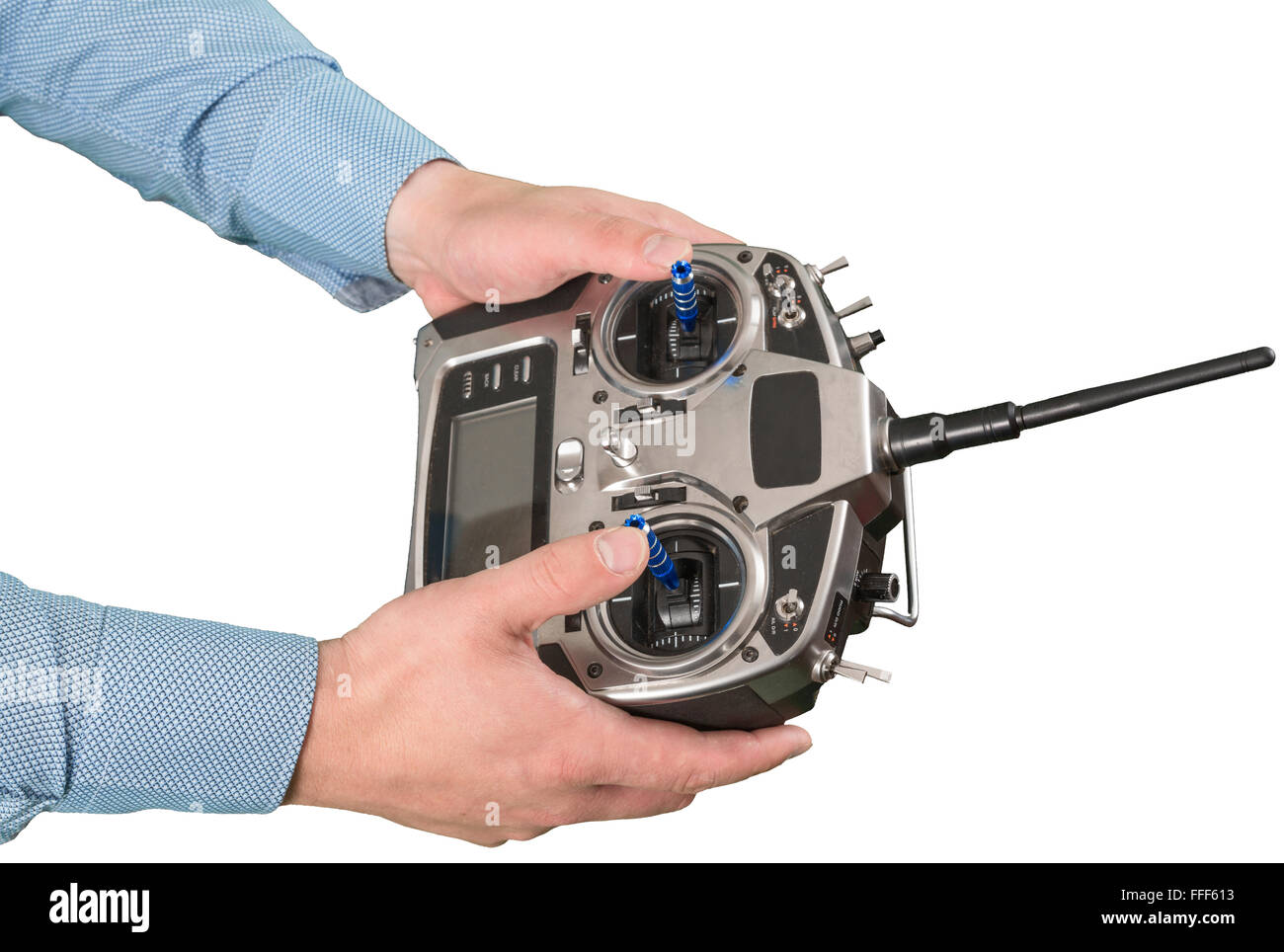 Flight remote controller in man's hands close up view on white ...