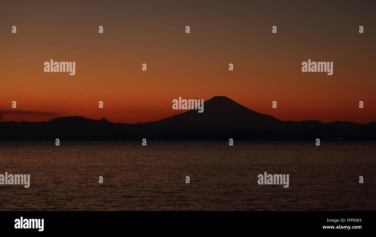 a photo of mount fuji during sunset Stock Photo - Alamy