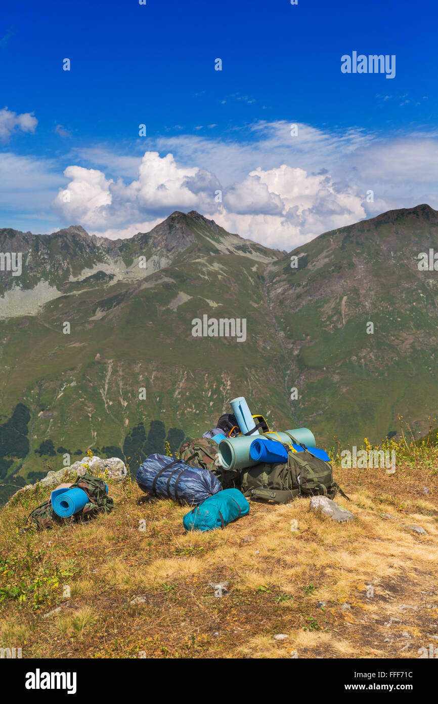 Beautiful mountain landscape with backpacks on foreground Stock Photo ...