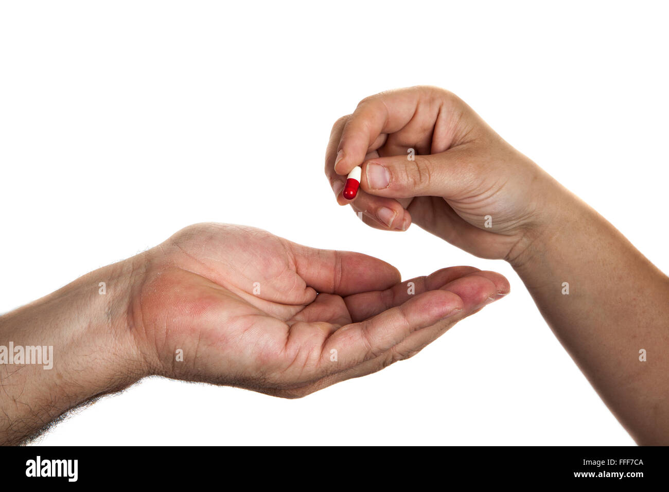Female hand gives pill in men Stock Photo - Alamy