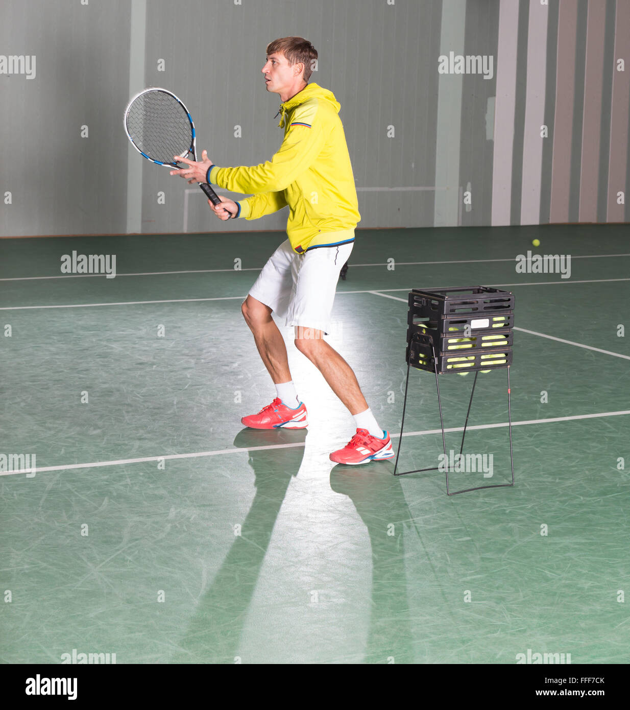 Professional tennis player have a training at indoor court Stock Photo ...