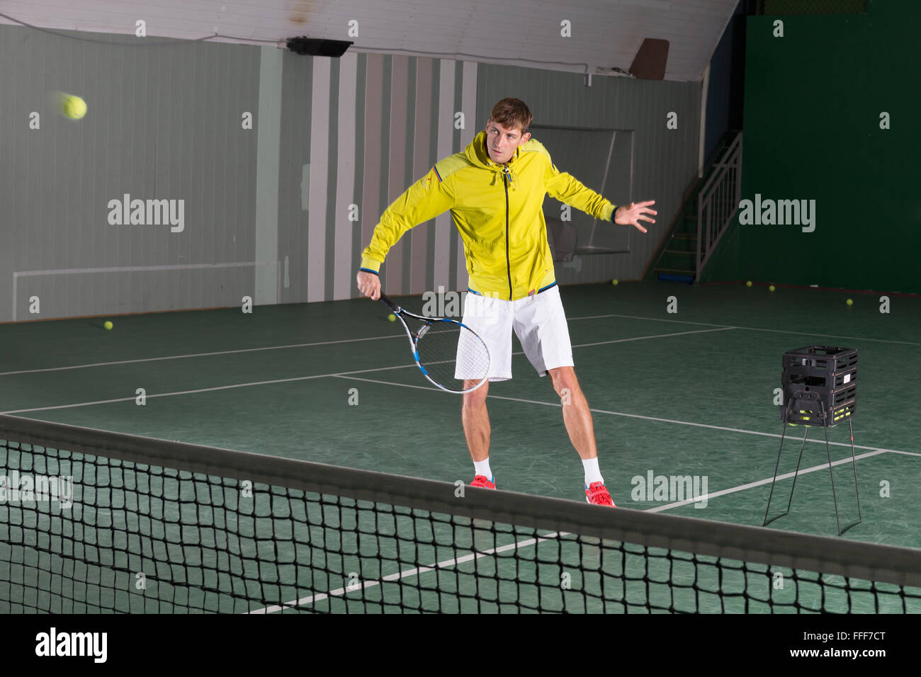 Professional tennis player have a training at indoor court Stock Photo ...